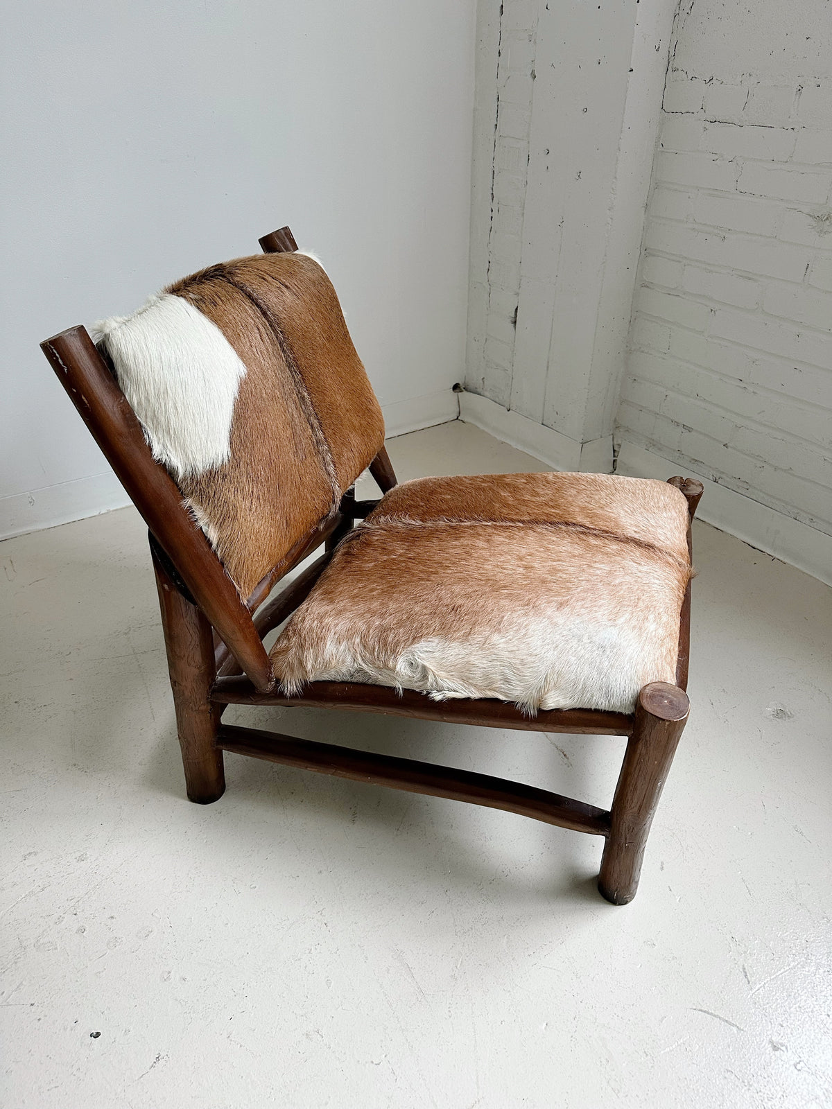 HANDMADE WOOD & HIDE CHAIRS | Maison Singulier