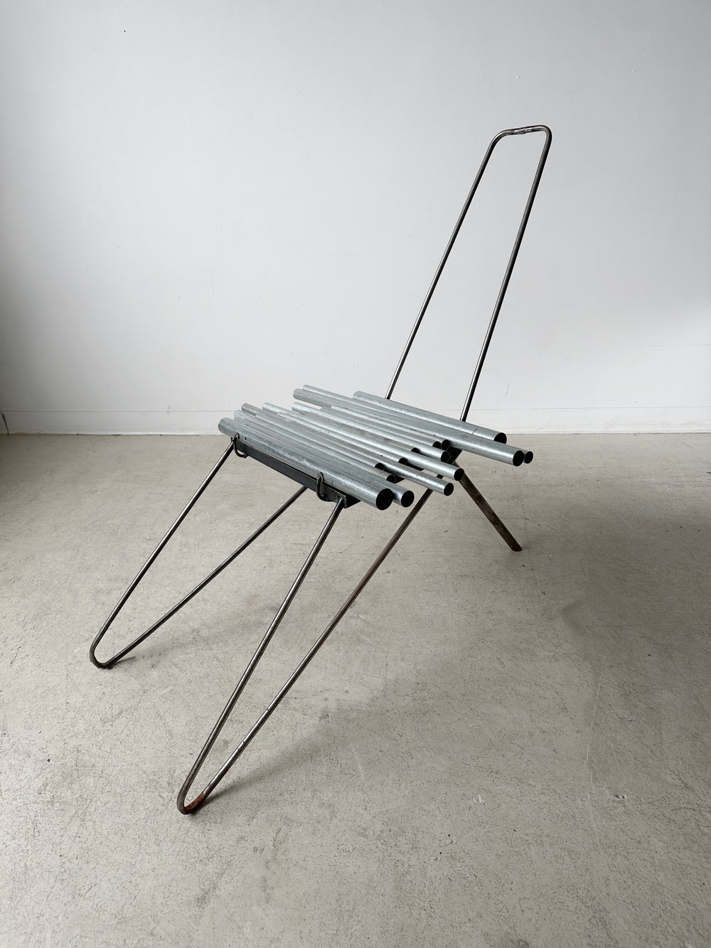 HANDMADE INDUSTRIAL ALUMINUM PIPE CHAIR | Maison Singulier