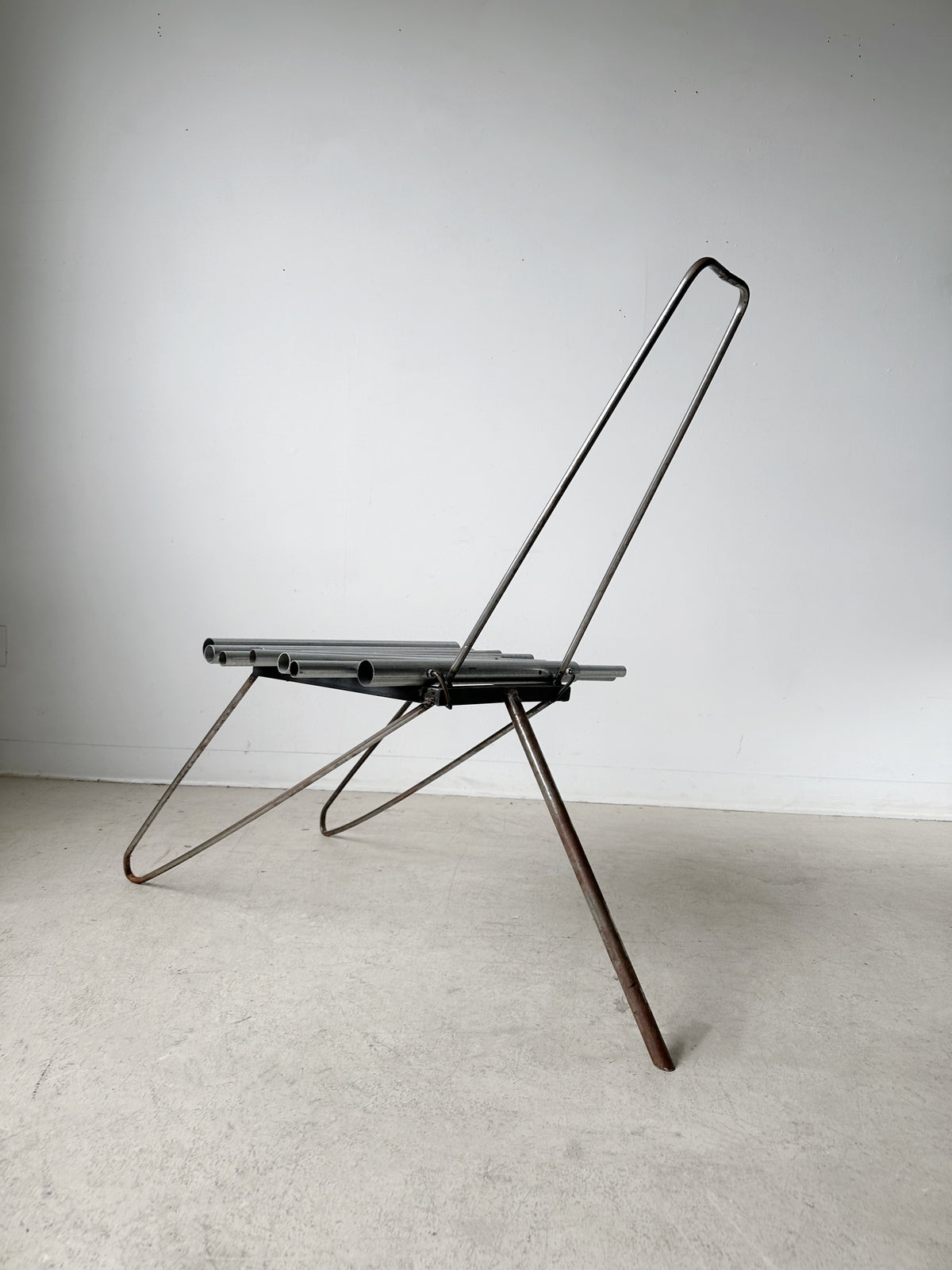 HANDMADE INDUSTRIAL ALUMINUM PIPE CHAIR | Maison Singulier