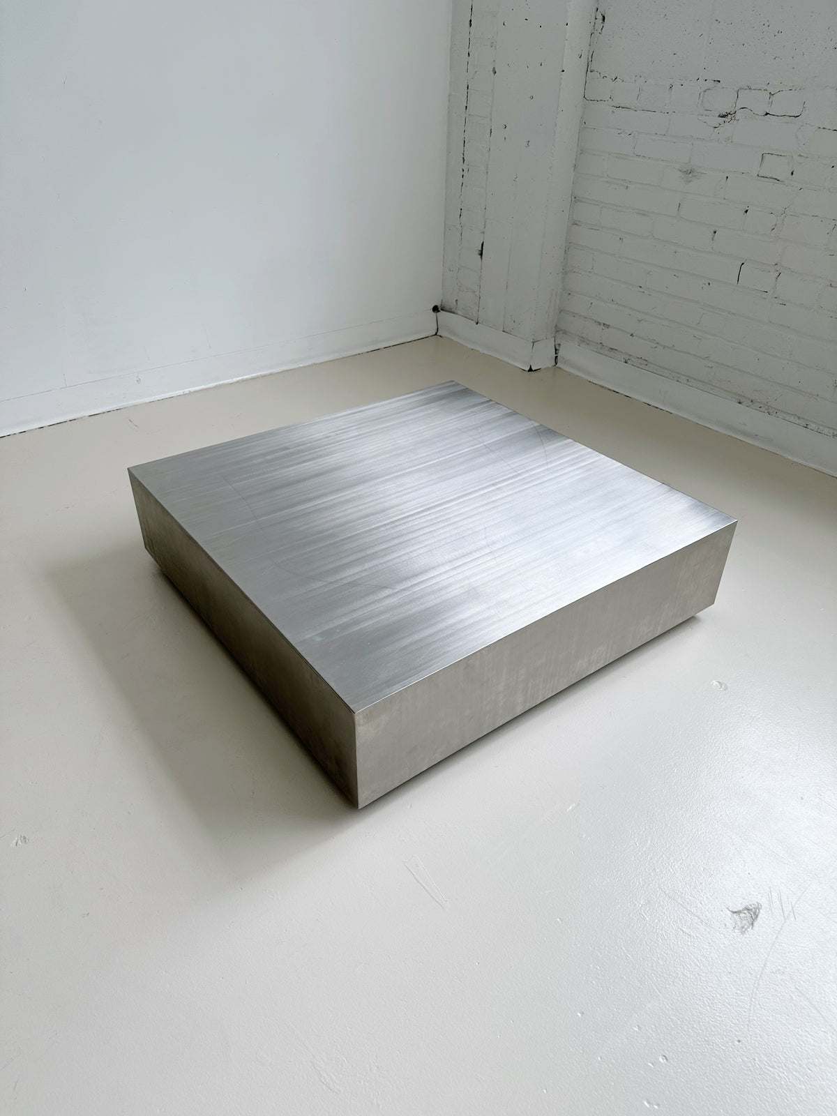 STAINLESS STEEL LOW COFFEE TABLE | Maison Singulier